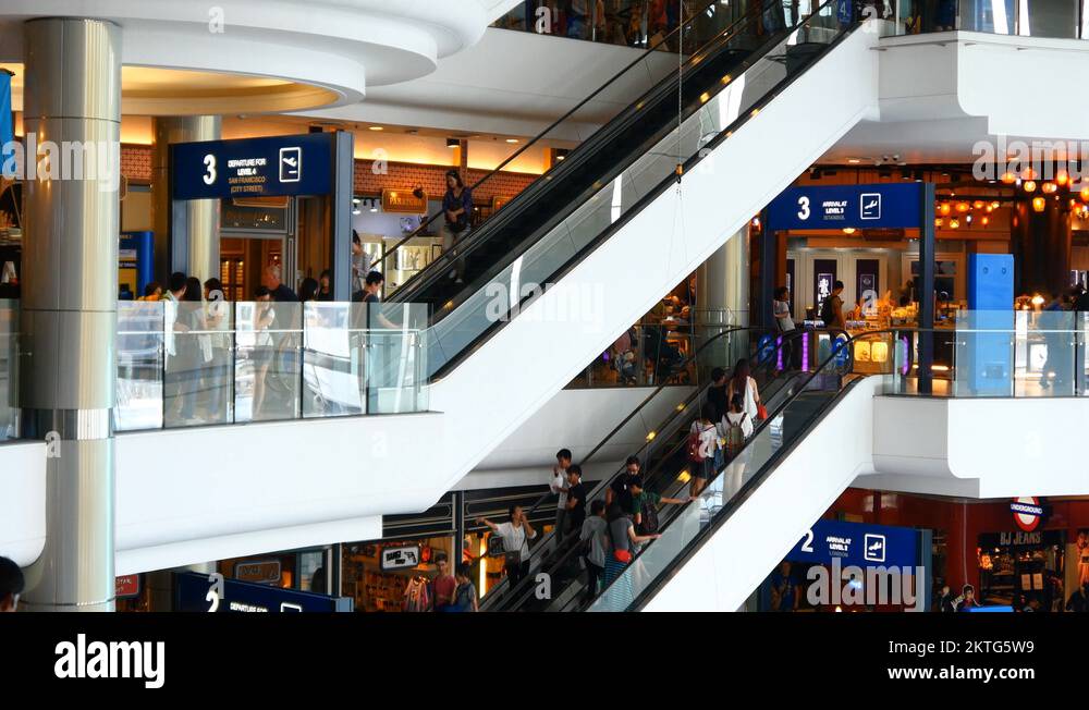 Escalator 4k shopping mall crowd people shop center centre sale shops time lapse Stock Video ...