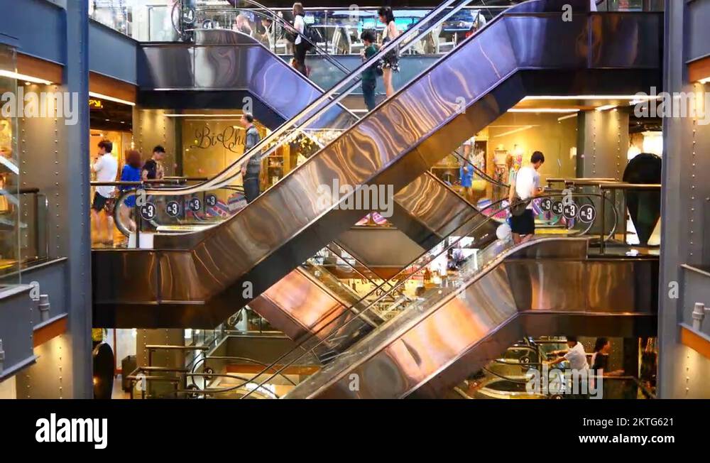 Escalator 4k shopping mall crowd of people buy shop center centre sales shops Stock Video ...
