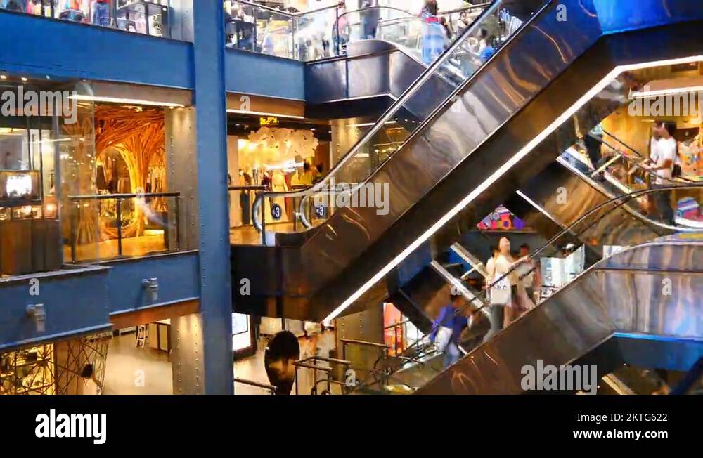 Escalator 4k shopping mall crowd people shop center centre sale shops time lapse Stock Video ...