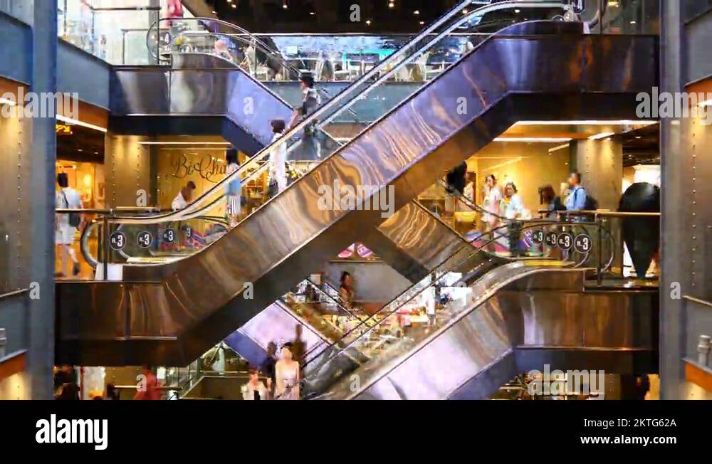 Escalator 4k shopping mall crowd people shop center money business time lapse Stock Video ...