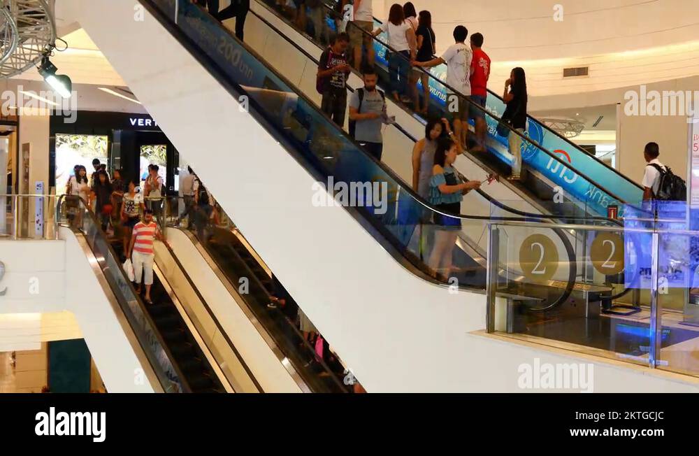 Escalator 4k shopping mall crowd of people buy shop center centre sales shops Stock Video ...