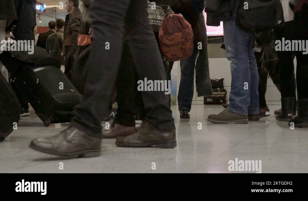 Legs commuters walking city underground subway airport crowd people ...
