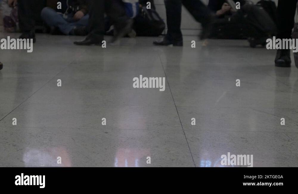 Legs commuters walking city underground subway airport crowd people ...