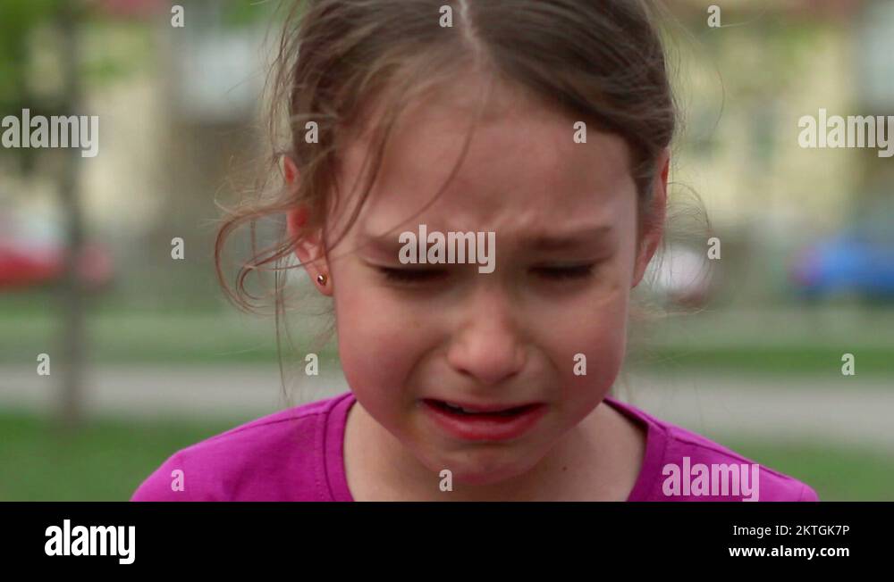Crying child in grief and sadness. Child crying with tears on face ...