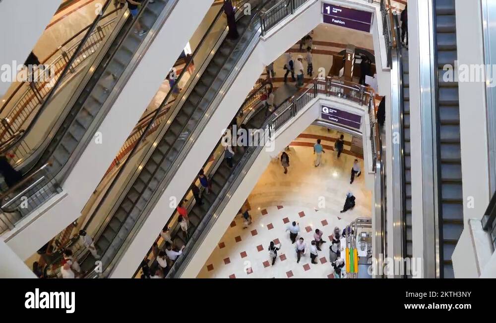 Escalator 4k shopping mall crowd of people buy shop center centre sales shops Stock Video ...