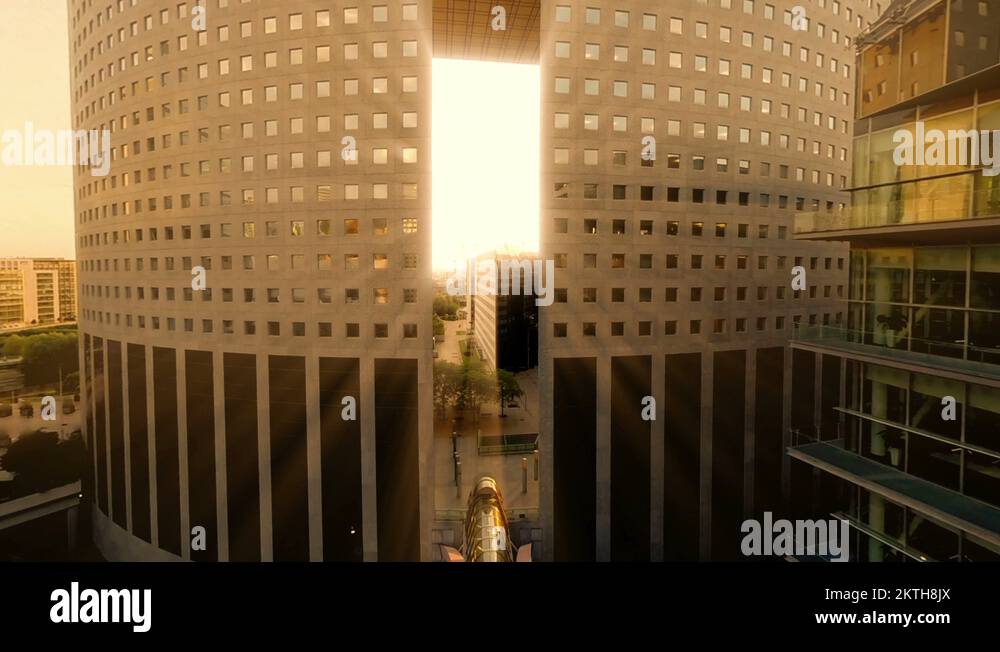 sun beam shines trough building. sun rays. helicopter fly over. city ...