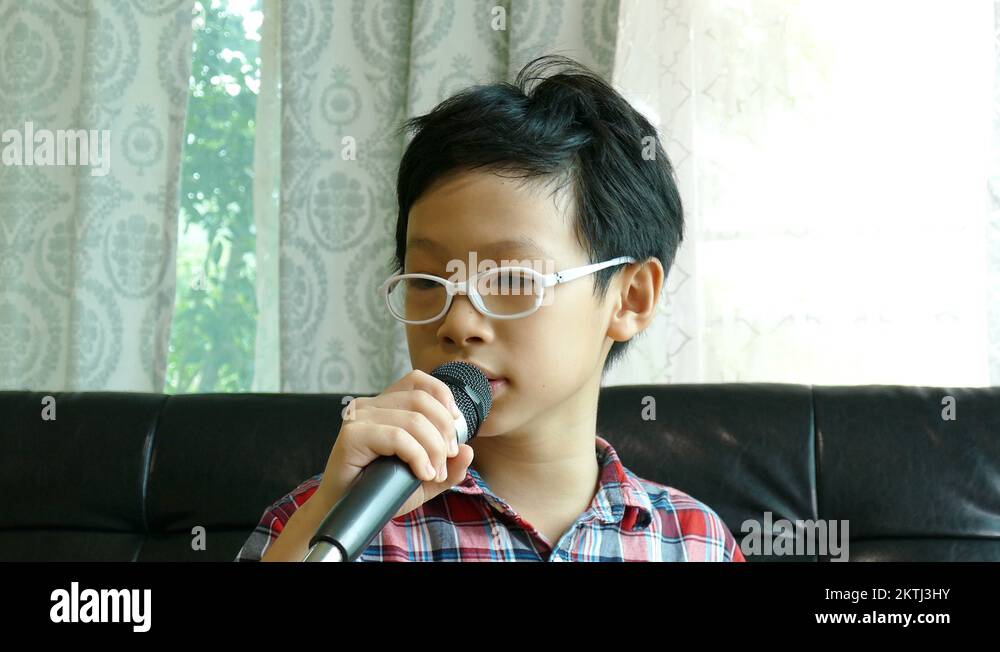 Boy sing Stock Videos & Footage - HD and 4K Video Clips - Alamy
