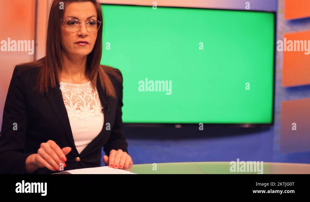 TV presenter ,Green Screen background ,side shot Stock Video Footage ...