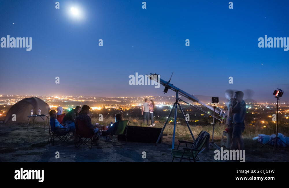 Process of the shot cinema on the background a night city. Time lapse ...