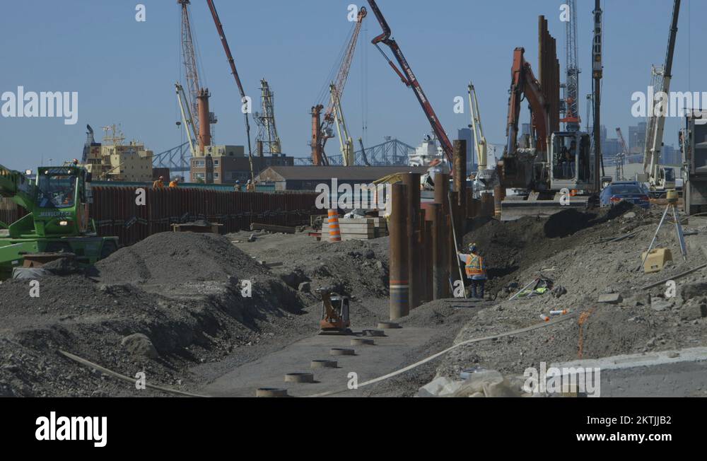Excavator digging a pit for foundation piles Stock Video Footage - Alamy