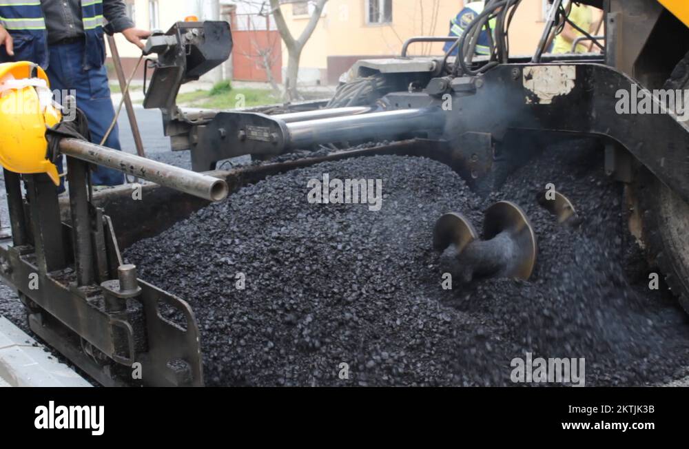 Asphalt spreading Machine asphalt bitumen Stock Video Footage - Alamy
