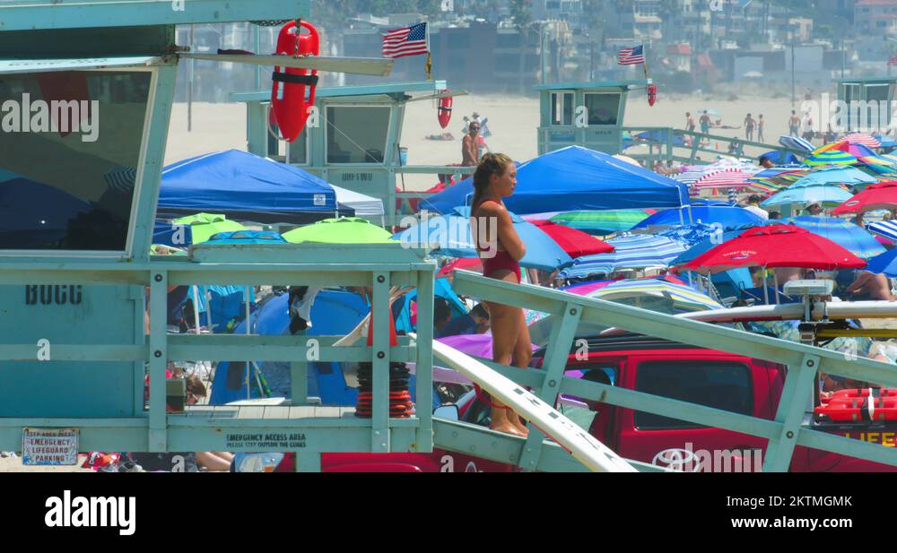 Female lifeguard watching people swimming in Venice Beach, Los Angeles ...