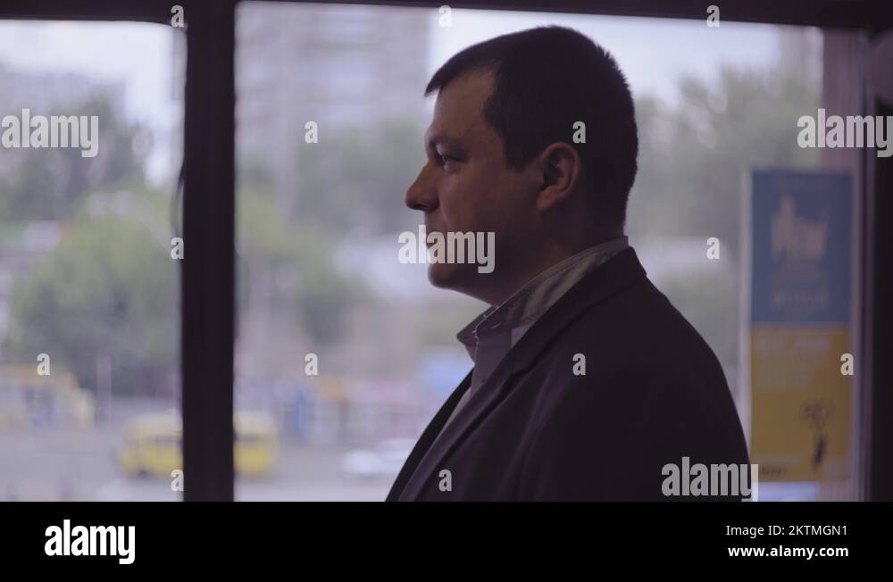 A man standing sideways, back and face shows thumb Stock Video Footage ...