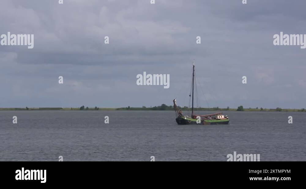 Traditional fishing boat called a botter or Volendammer kwak, floating ...