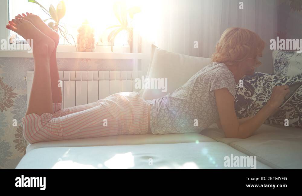 Woman laying on sofa legs Stock Videos & Footage - HD and 4K Video ...