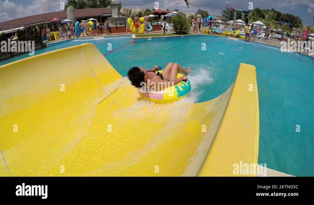 Woman on water slide Stock Videos & Footage - HD and 4K Video Clips - Alamy
