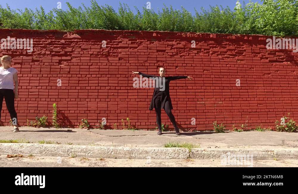 The art of dance. Group of four young people dancing in the street. 4K ...