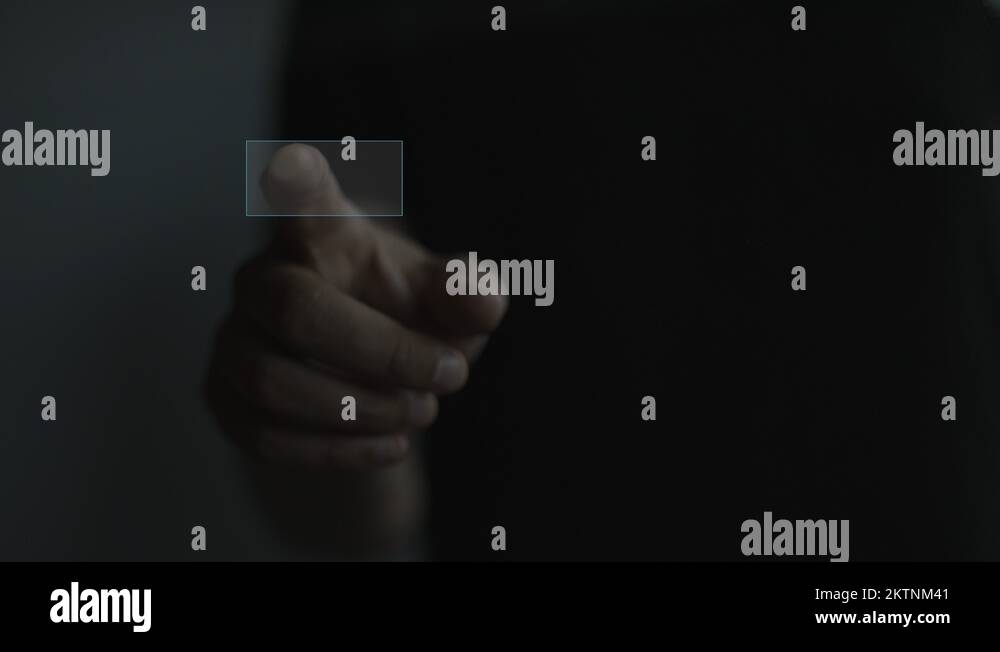 Man touching a visual screen with holographic computer icons Stock ...