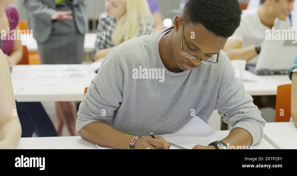 Female teacher teaching her students in a classroom Stock Videos ...