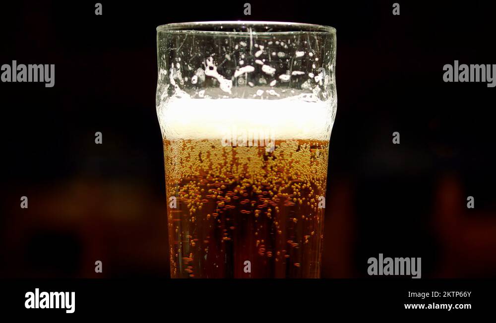 FIZZY PINT OF LAGER BEER SCARBOROUGH ENGLAND Stock Video Footage - Alamy