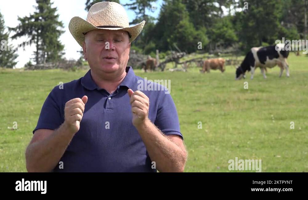 Ranch Farmer Wearing Cowboy Hat Give a Press Interview Explaining and ...