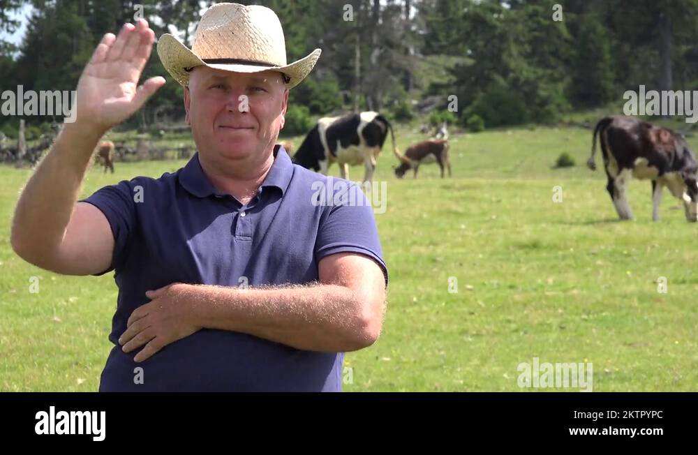 American Ranch Farmer Presentation Saluting Visitors with Hello Hand ...