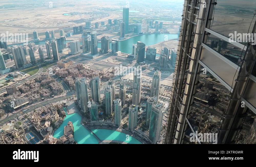 Top view on Dubai from glass window on 124th floor of Burj Khalifa ...