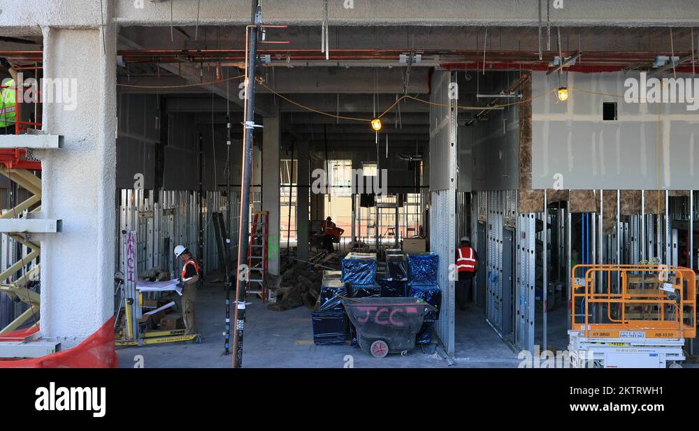 Construction workers building new hospital building DCI 4K Stock Video ...