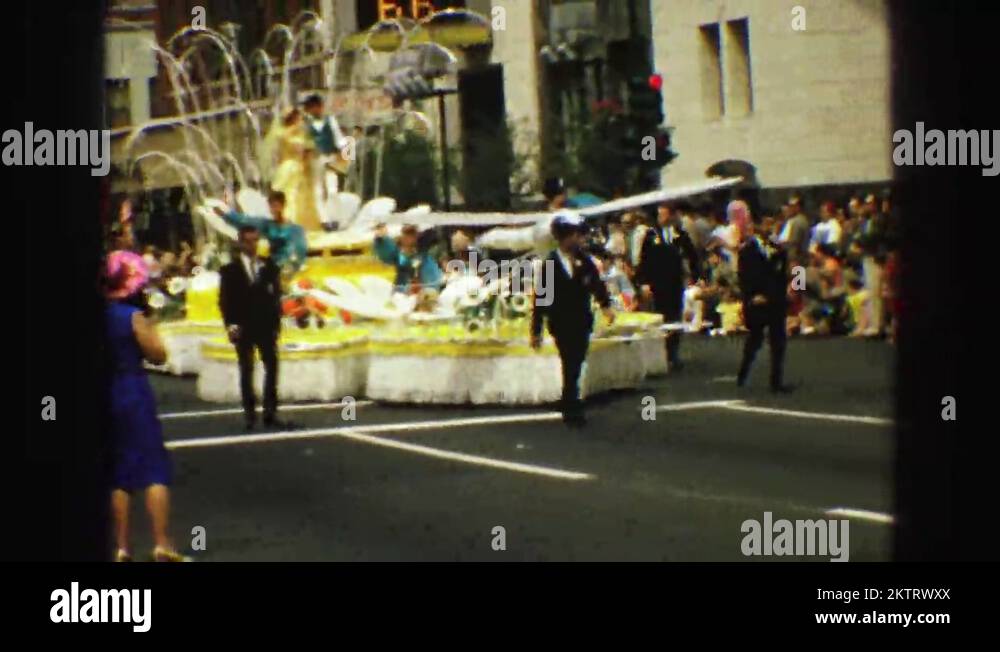1968: a group of people celebrating carnival on the road VANCOUVER ...