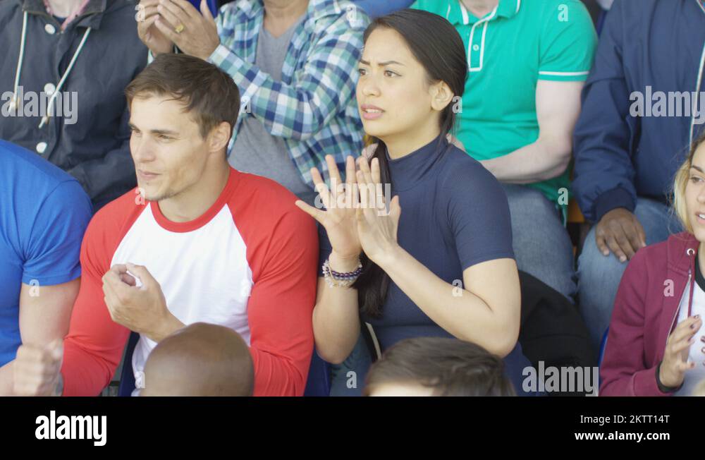 4K Excited fans in sports crowd, celebrating & cheering on their team ...