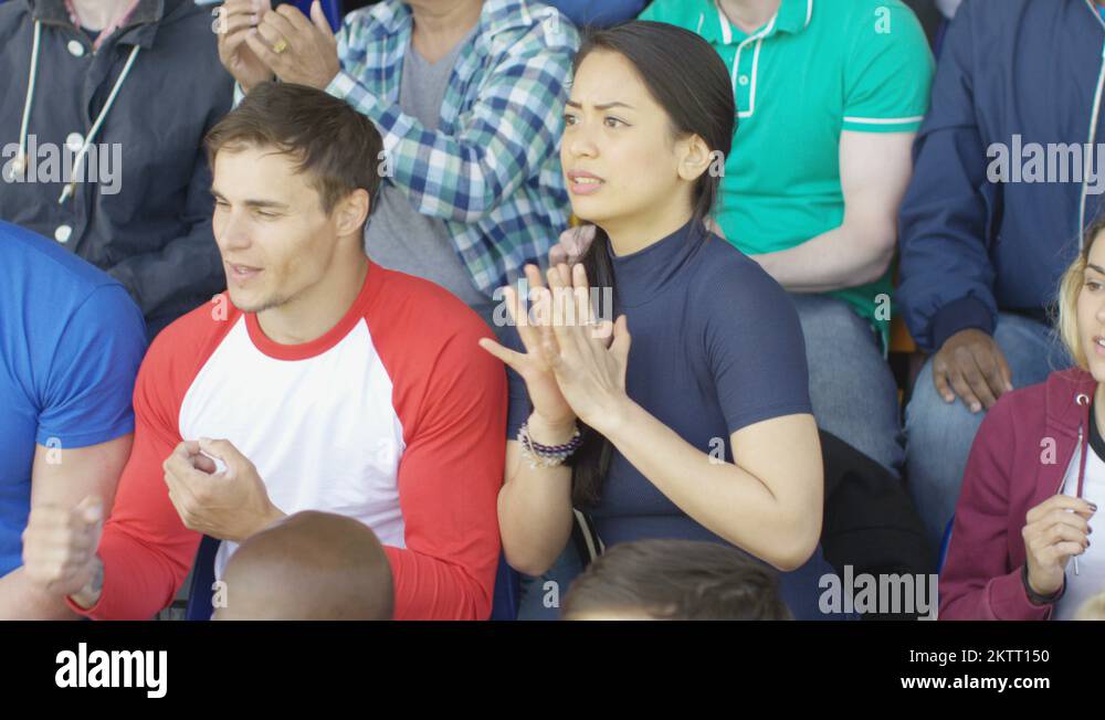 4K Excited fans in sports crowd, celebrating & cheering on their team ...
