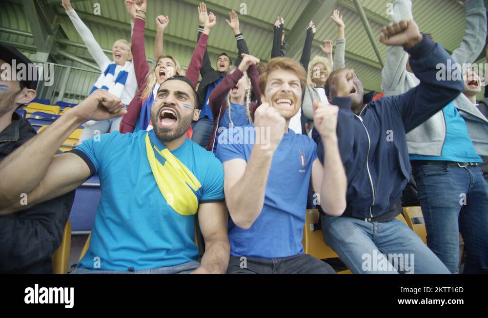 4K Excited fans in sports crowd, celebrating & cheering on their team ...