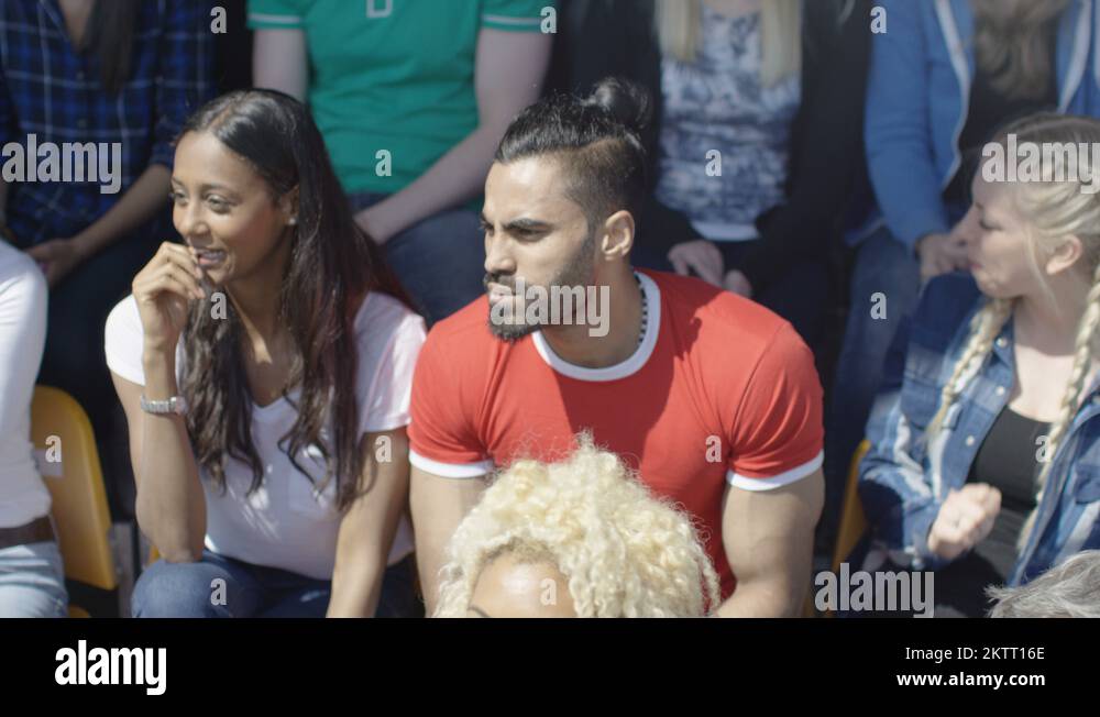 4K Sports fans in crowd expressing disappointment, watching live game ...