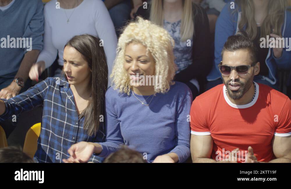 4K Excited fans in sports crowd, celebrating & cheering on their team ...