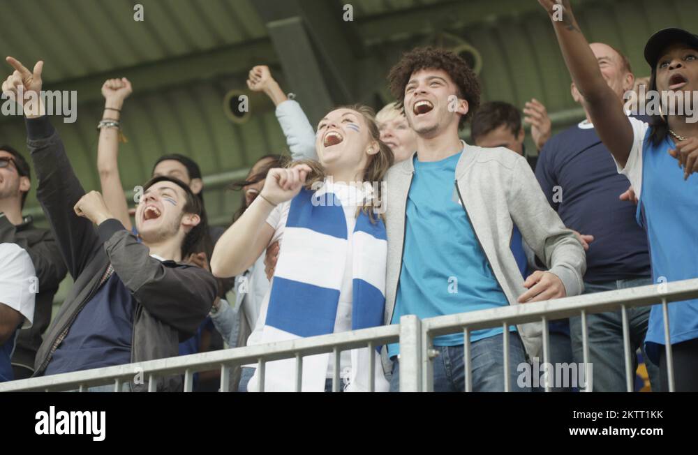 4K Excited sports fans at live event clapping & cheering for their team ...