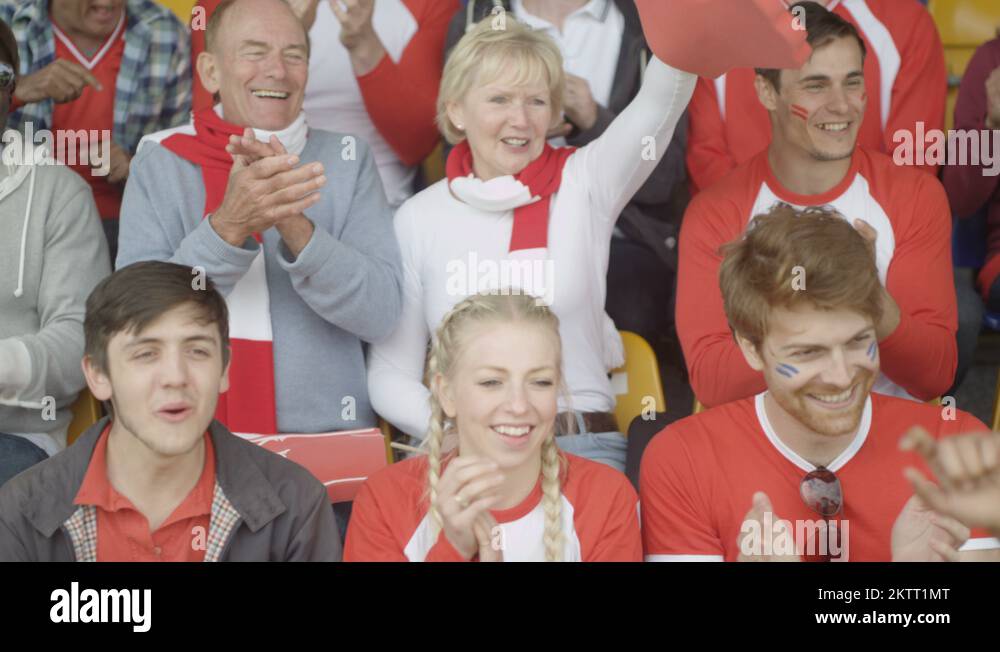 4K Excited fans in sports crowd cheering on their team Stock Video ...