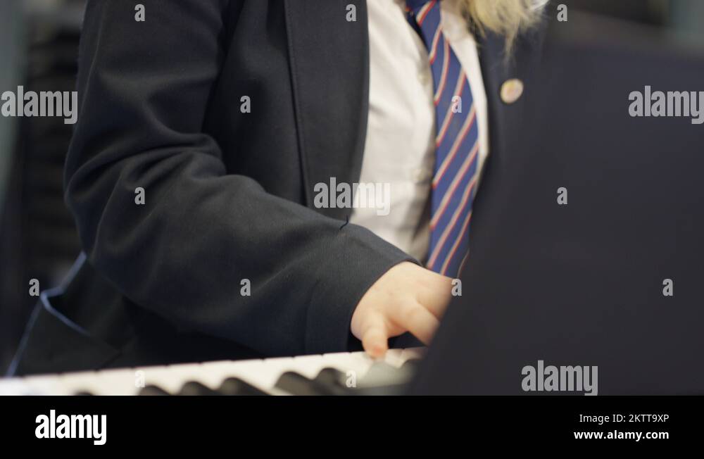 4K Teen girl singing solo & playing keyboard instrument in school music ...