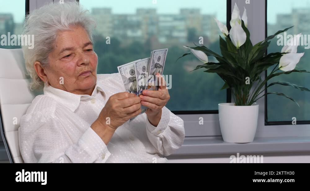 Retired Grandma Counting Money Savings Us Dollars Cash in Home ...