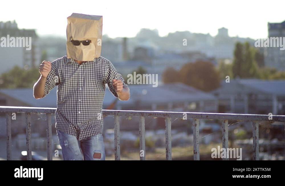 Paper bag head man Stock Videos & Footage - HD and 4K Video Clips - Alamy