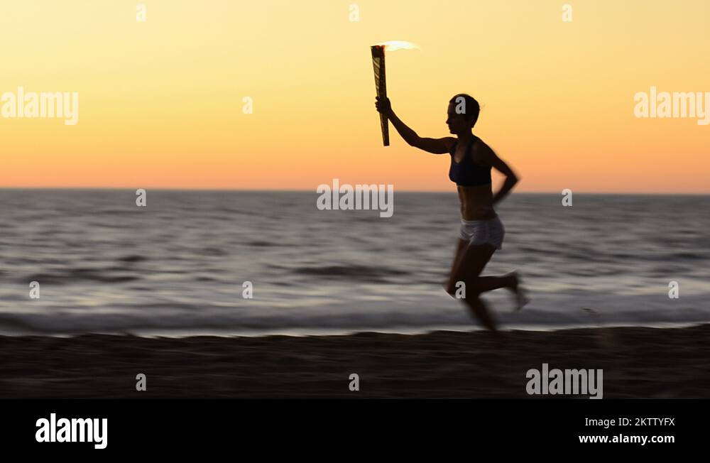 Woman running with the olympic torch Stock Videos & Footage - HD and 4K ...