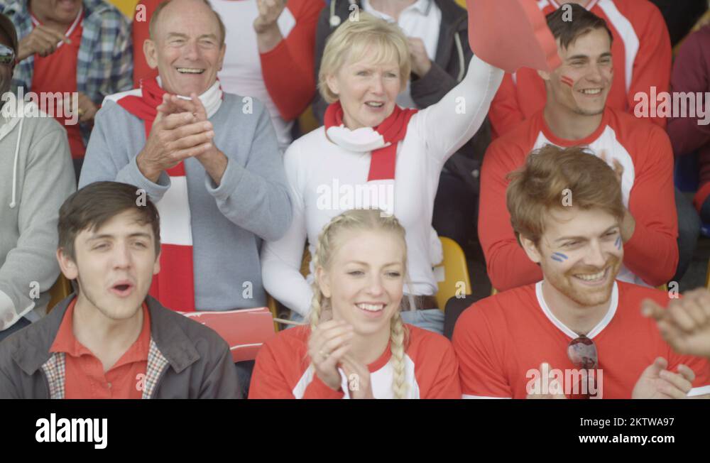 4K Excited fans in sports crowd cheering on their team Stock Video ...