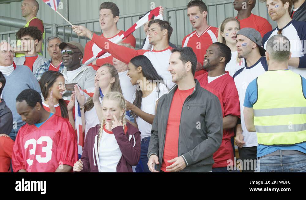 4K Excited sports crowd with British flag clapping & cheering on their team Stock Video Footage ...