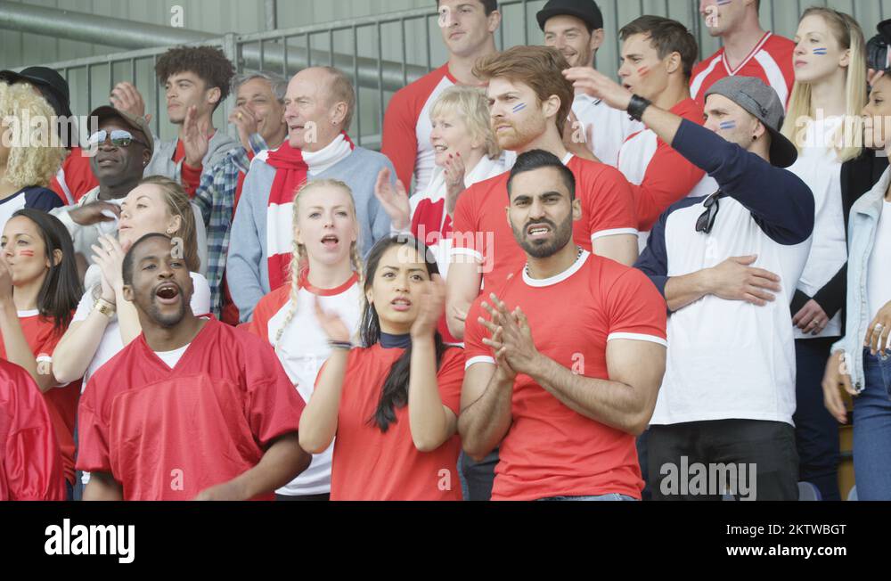 4K Sports fans in crowd expressing disappointment, watching live game in stadium Stock Video ...
