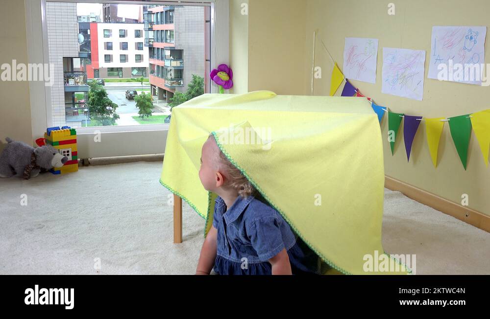 Child under table Stock Videos & Footage - HD and 4K Video Clips - Alamy