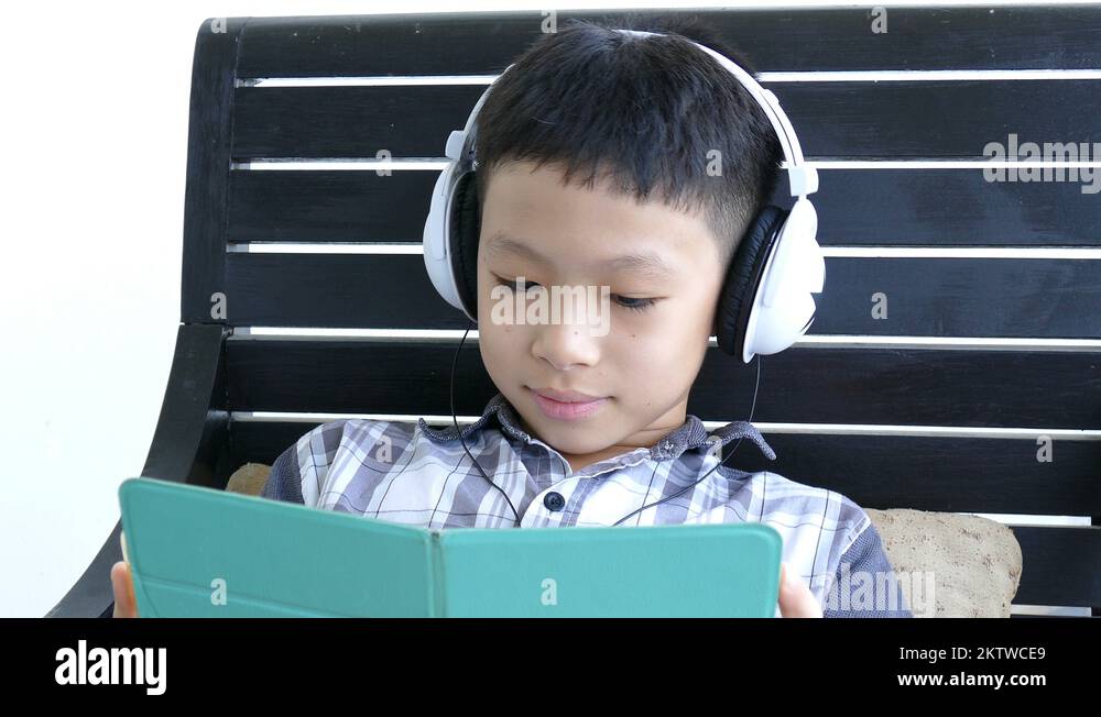 Computer headphone kid Stock Videos & Footage - HD and 4K Video Clips ...