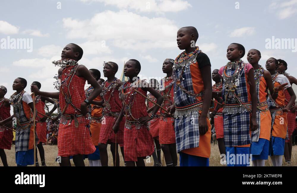 group of maasai boys dancing at koiyaki guiding school graduation in ...