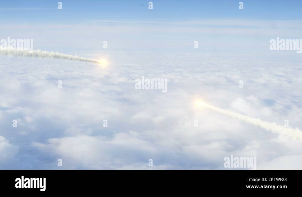 Two rockets fired from point of view above the clouds into the distance ...