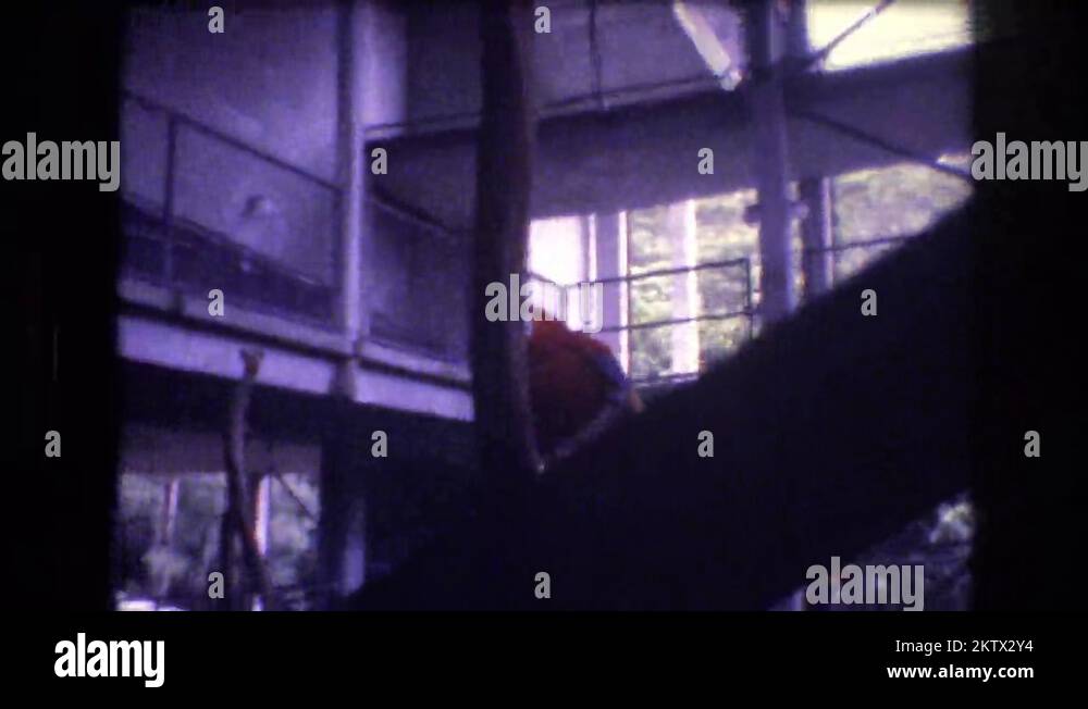 1977: the inside of a large metal building with lots of windows and ...