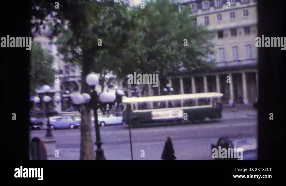 1967: road vehicles moving street lamp beautiful building trees people ...