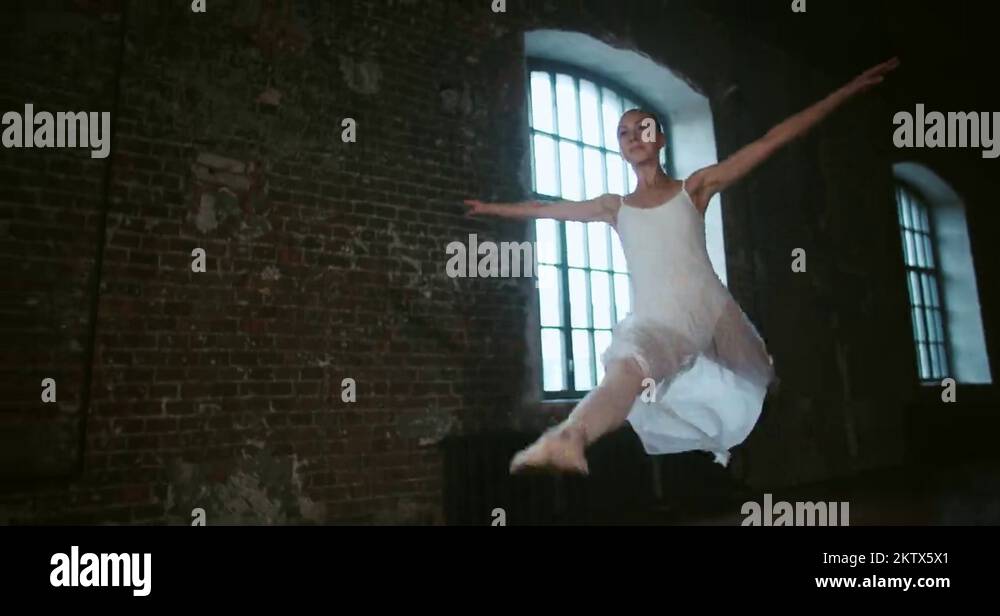 beautiful girl ballerina performs pirouettes of classical ballet to the ...